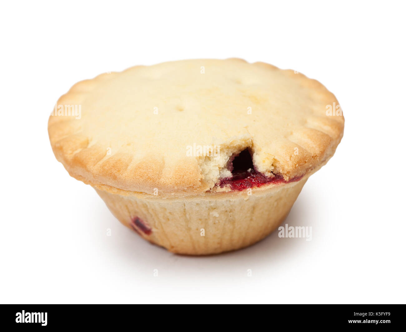Small bitten cake isolated on white background Stock Photo - Alamy