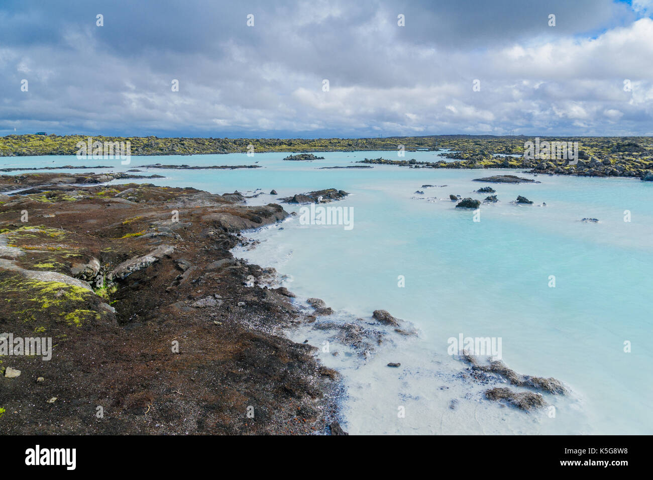 Volcanic landscape and hot pools near the Blue Lagoon, in a lava field ...