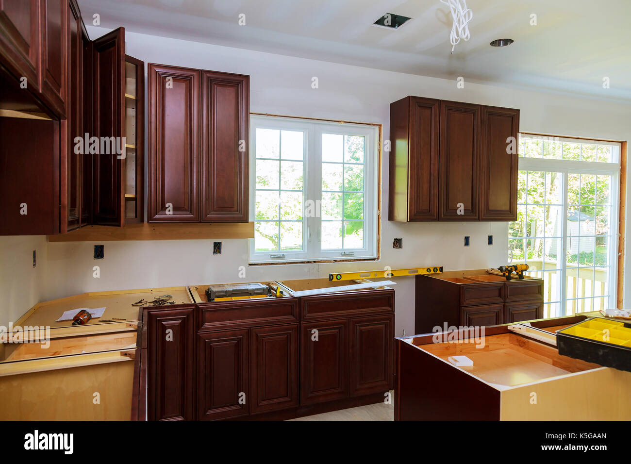 Installing new induction hob in modern kitchen kitchen Installation of ...