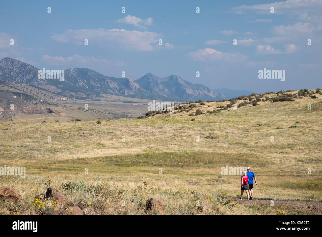Golden, Colorado - A couple walking in North Table Mountain Park, a ...