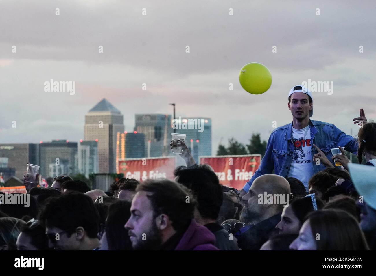 London, UK. 9th September, 2017. A festival goer on a friend's ...
