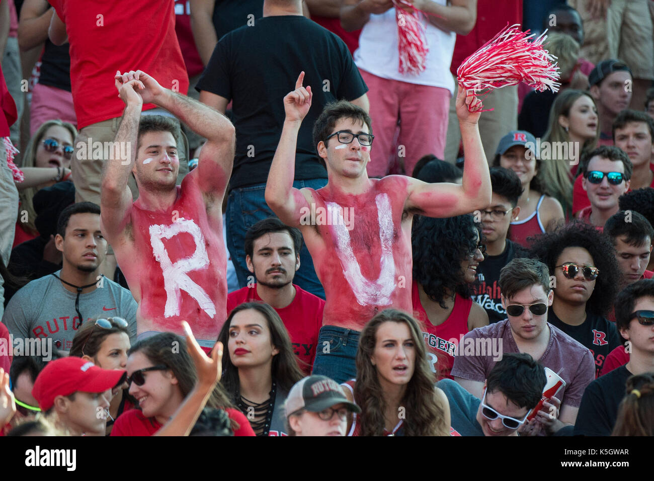 Fans rutgers scarlet knights cheer hi-res stock photography and images ...