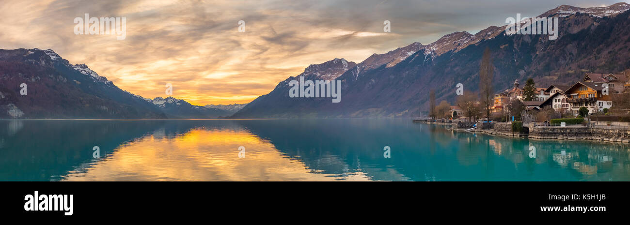 Sunset view of the village and hills at lake brienz, Switzerland Stock ...