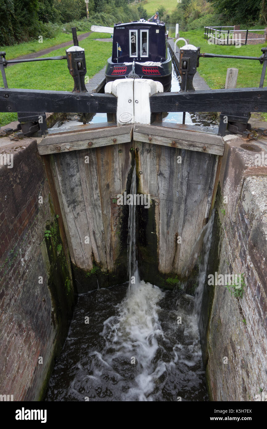 Barge entering lock on the Staffordshire and Worcestershire Canal. UK ...