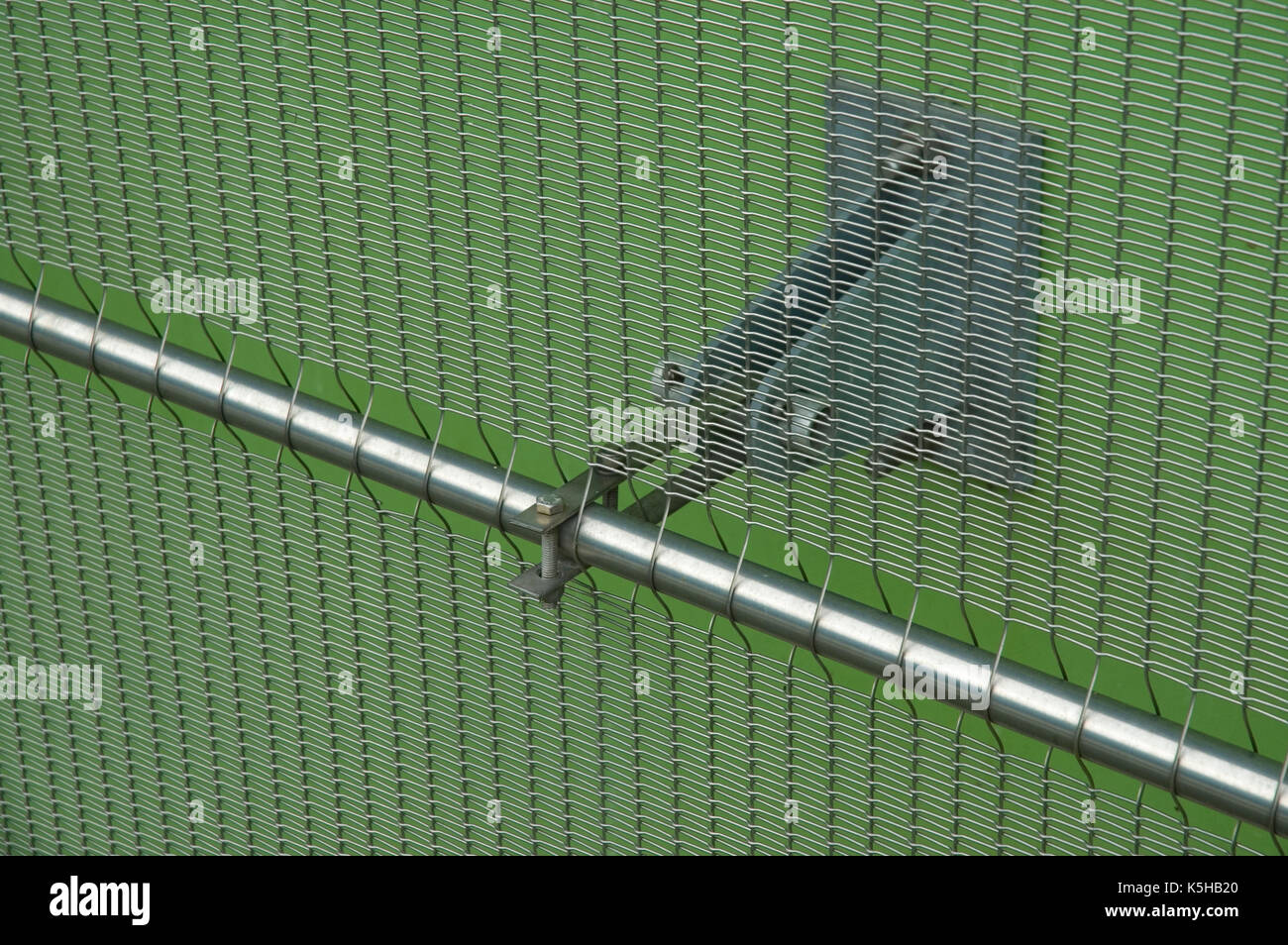 fixation of a steel mesh at a facade Stock Photo - Alamy