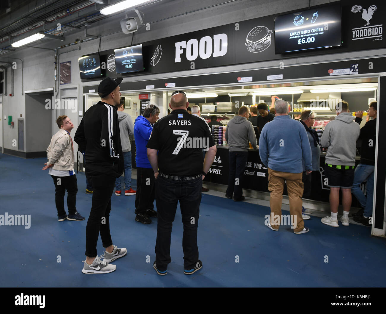 Fans queue for refreshments before the Premier League match at the AMEX ...