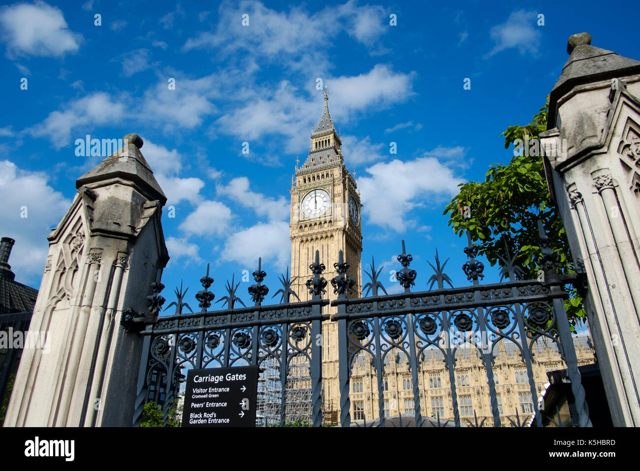 Gate of Palace of Westminster with Big Ben in background on summer's ...