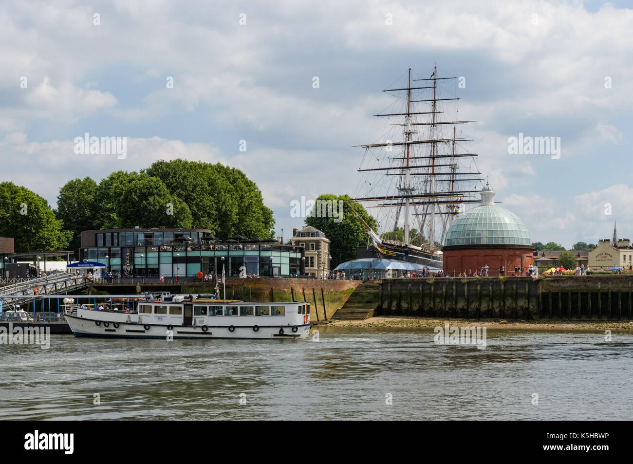 Greenwich Pier with Cutty Sark clipper ship and Greenwich Foot Tunnel entrance, London England ...