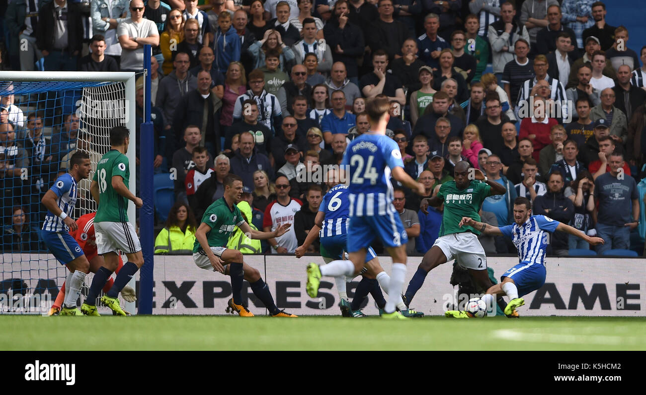 Brighton & Hove Albion's Pascal Gross (right) scores his side's first ...