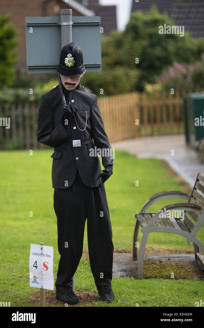A police officer scarecrow on display at Harpole Villiage in ...