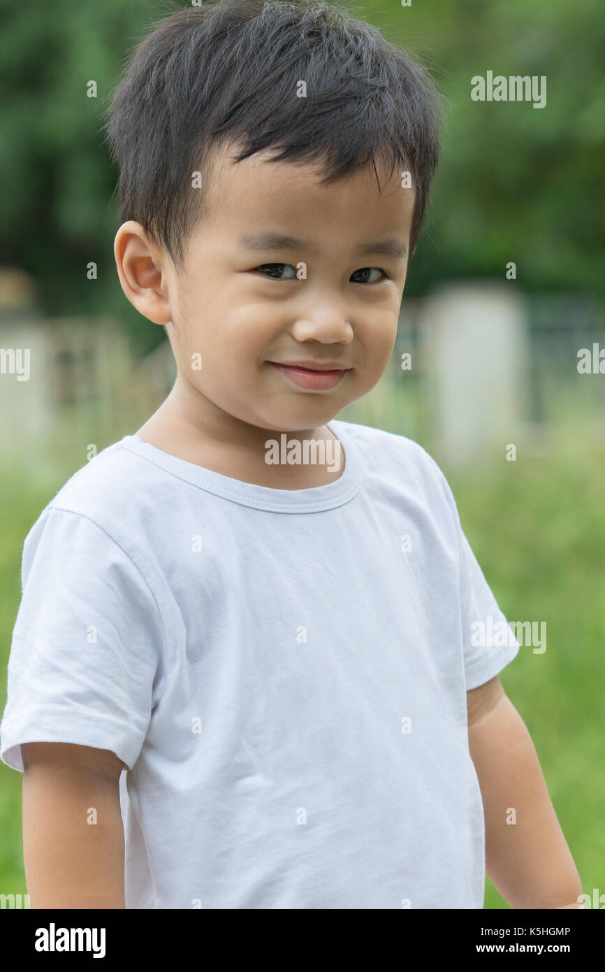 outdoor portrait head shot of asian children smiling face looking with ...