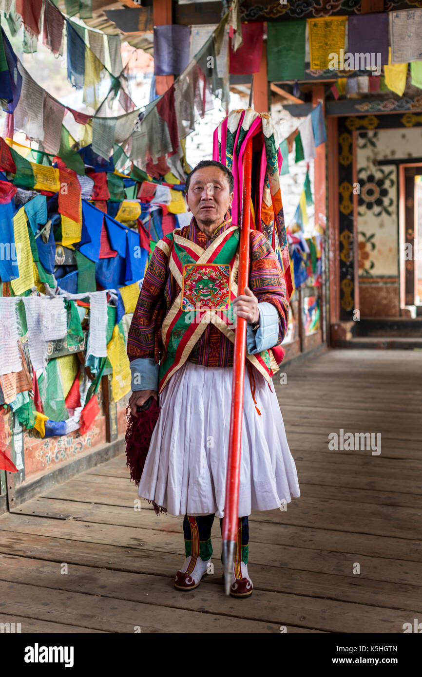 Older Bhutan man in traditional soldier's costume and armor on the ...