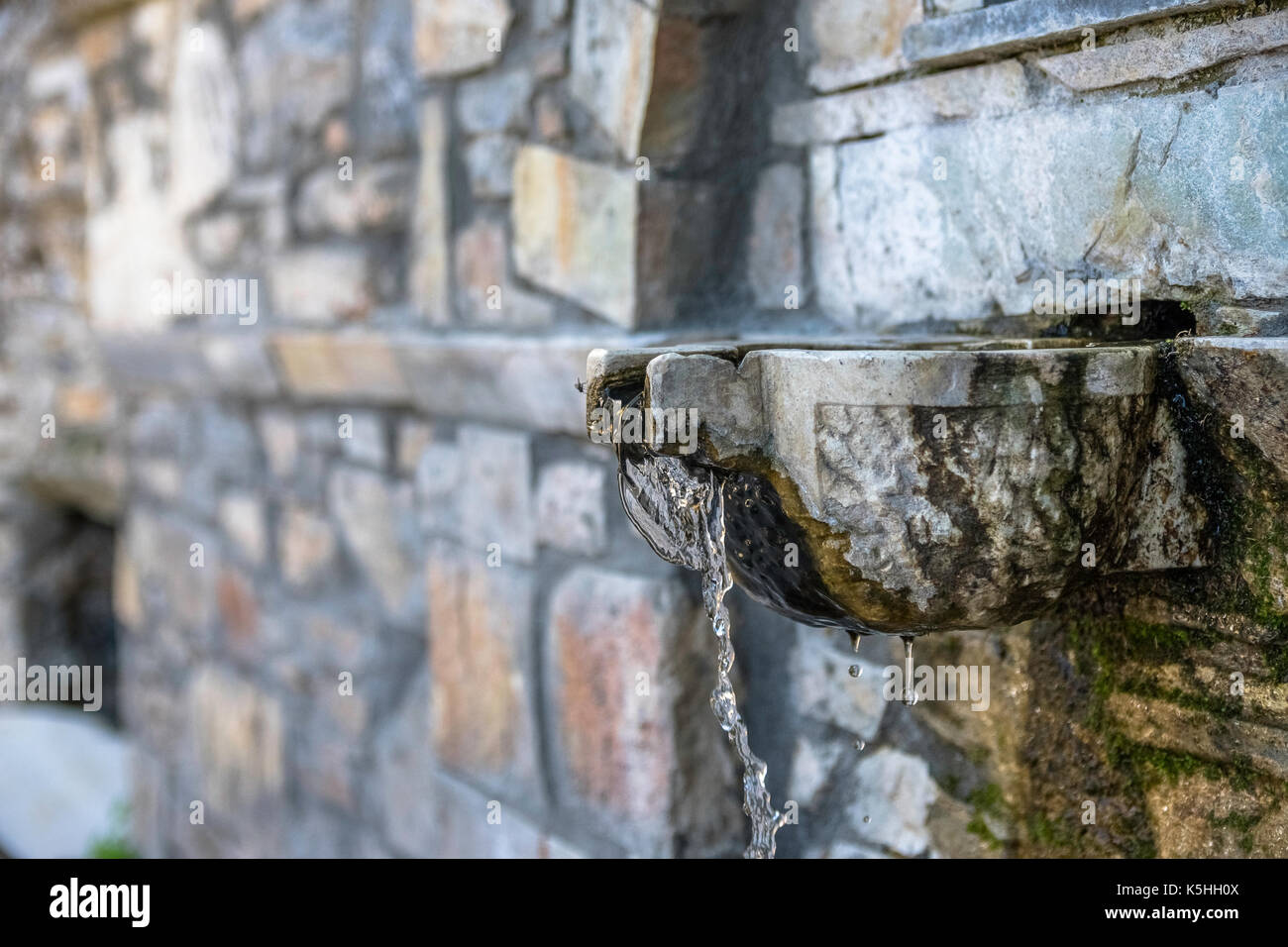 Water spring in Ambelakia,Greece Stock Photo - Alamy