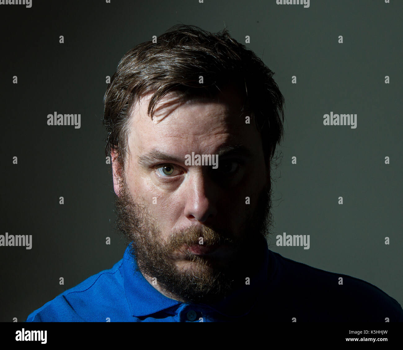 Man staring straight ahead Stock Photo - Alamy