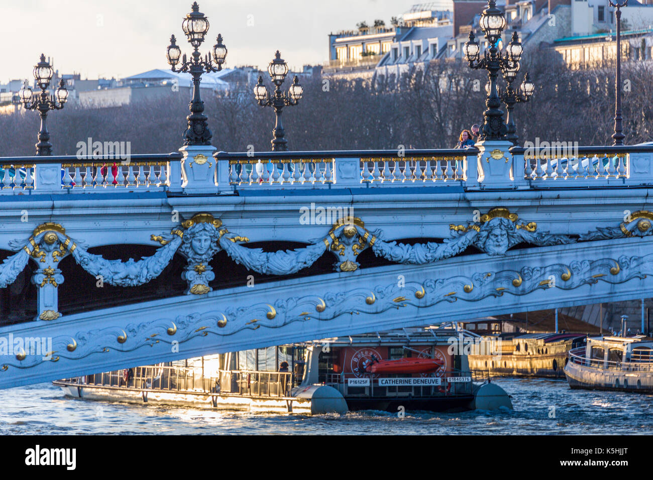 Pont Alexandre III, the Seine, boats, from across the river at sunset ...