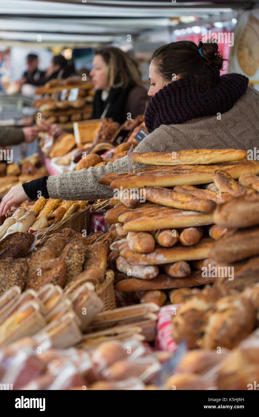 Bread stall at the Saxe-Breteuil street market near the Eiffel Tower in ...