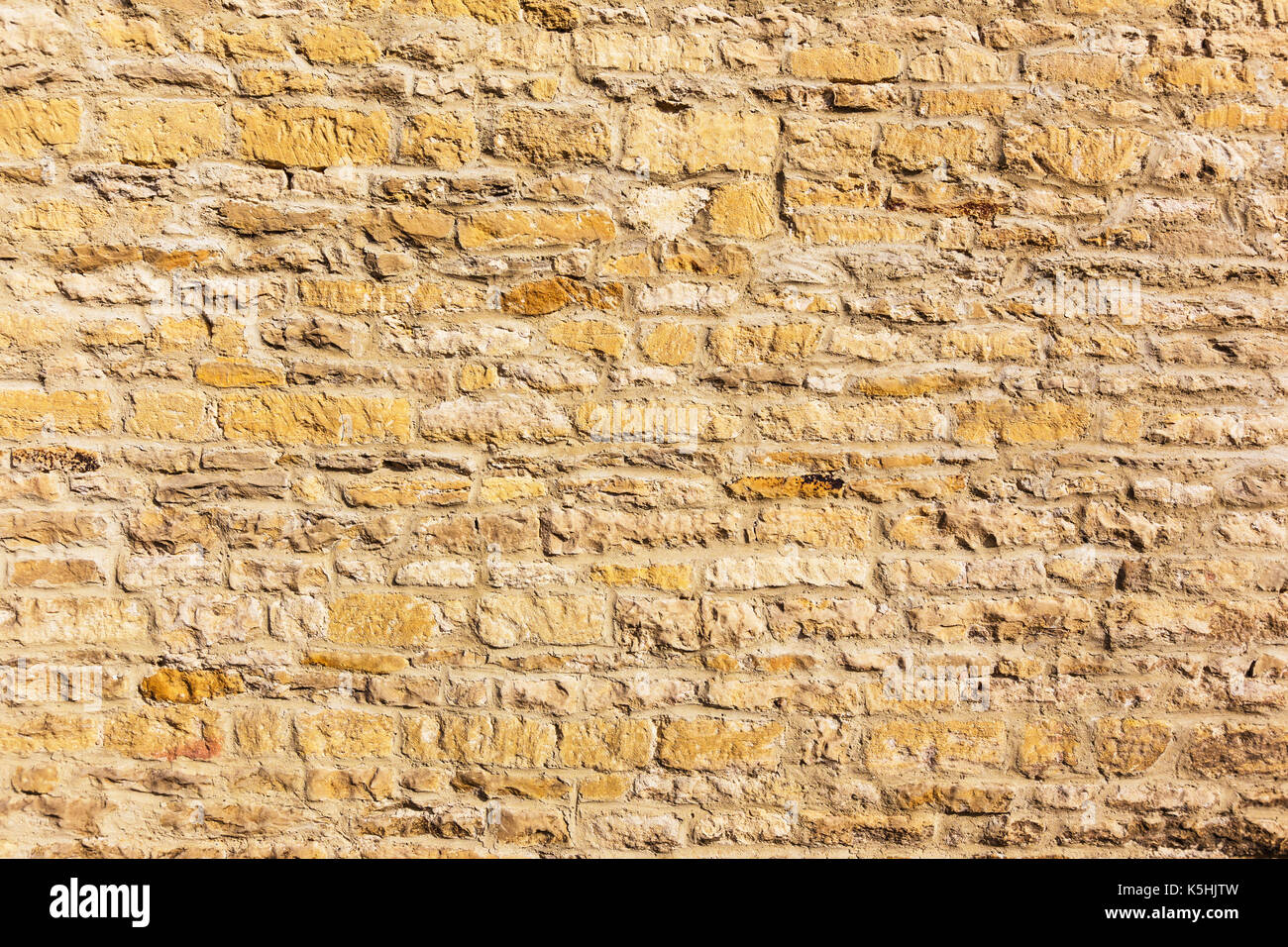old weathered stone brick wall, good for background Stock Photo - Alamy