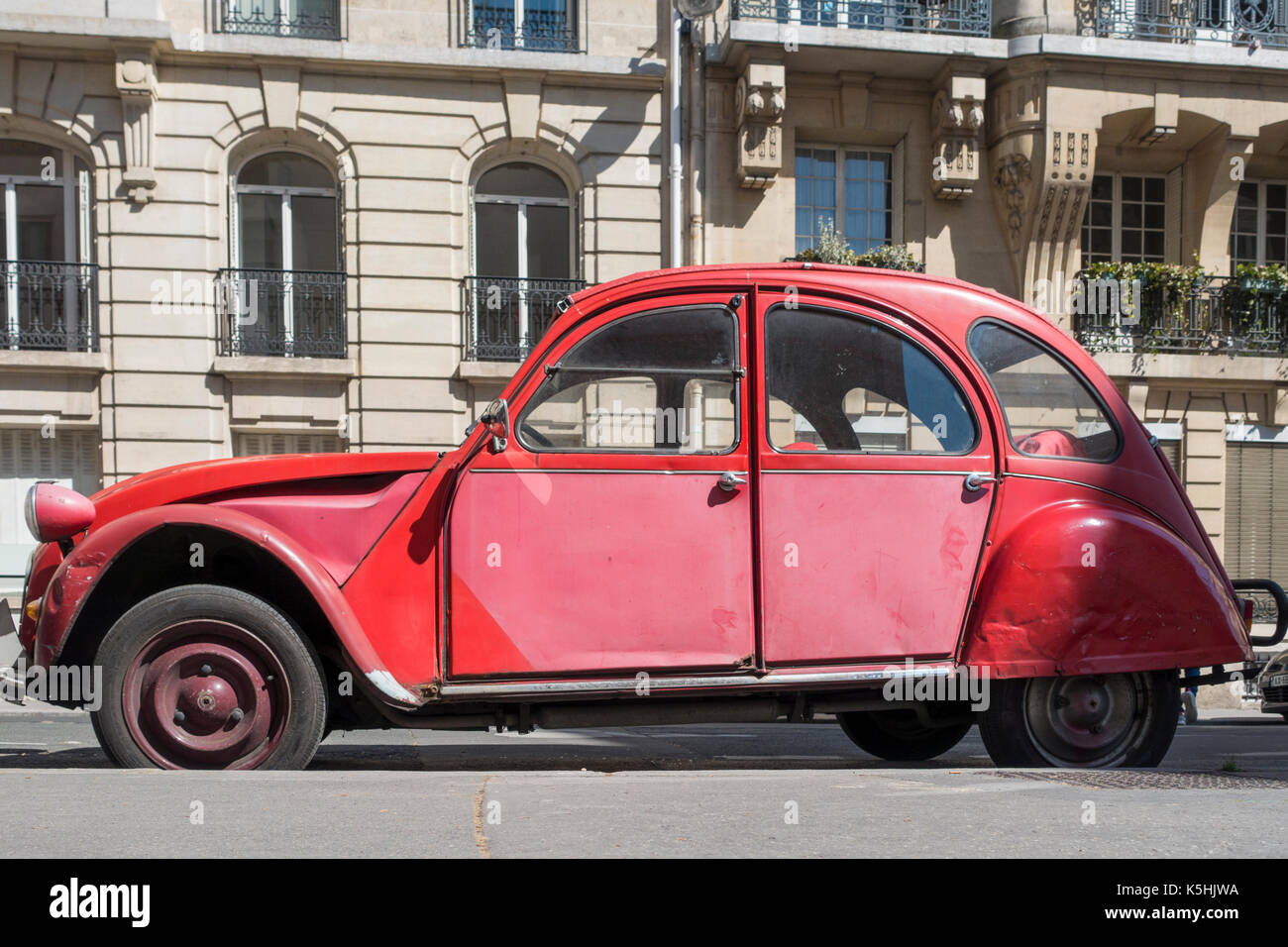 Vintage red Citroen 2CV in the street in Paris in the 7th ...