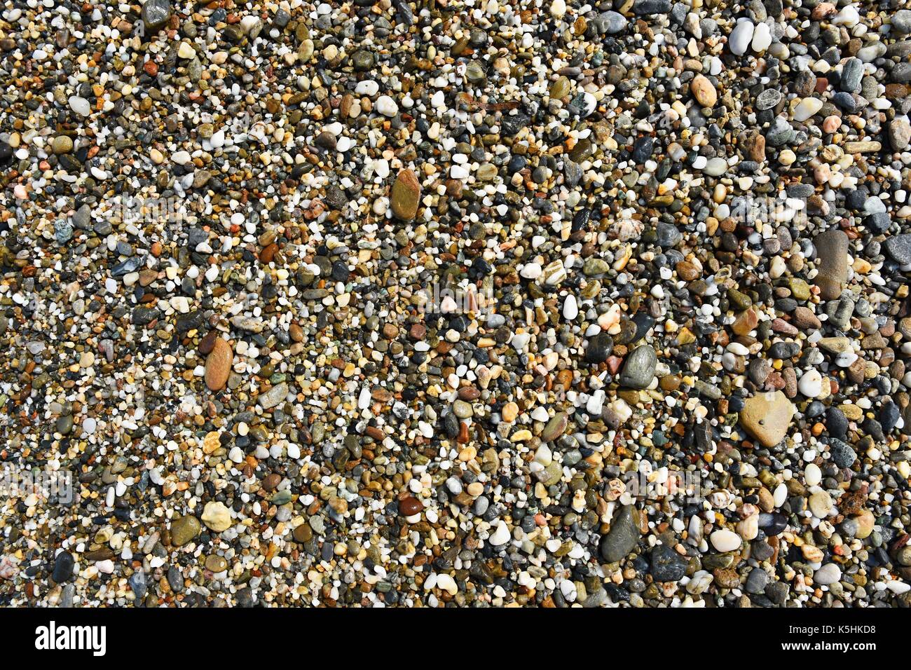 Abstract colorful background with small stones Stock Photo - Alamy