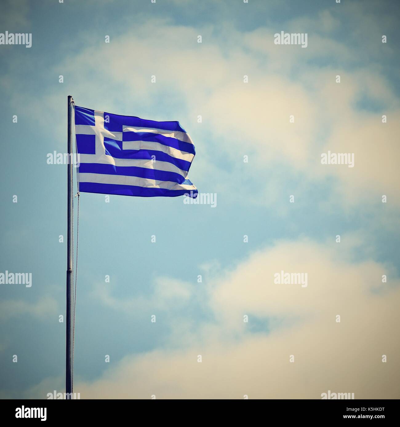 Flag of Greece Flying in Wind and Blue Sky. Summer background for ...