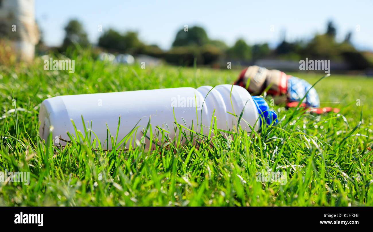 Soccer (football) water bottle on the green field Stock Photo - Alamy