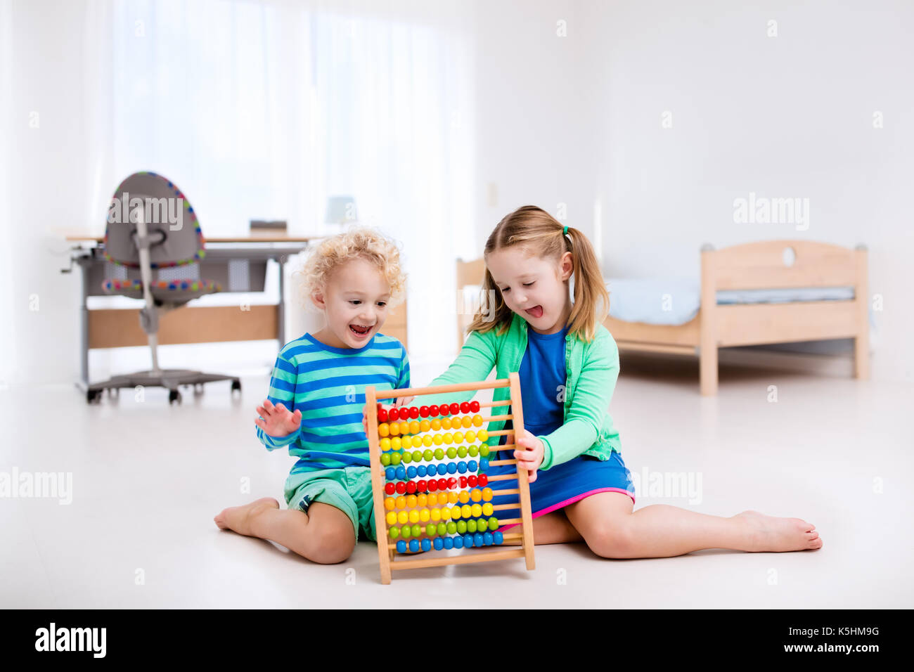Nursery school children counting hi-res stock photography and images ...
