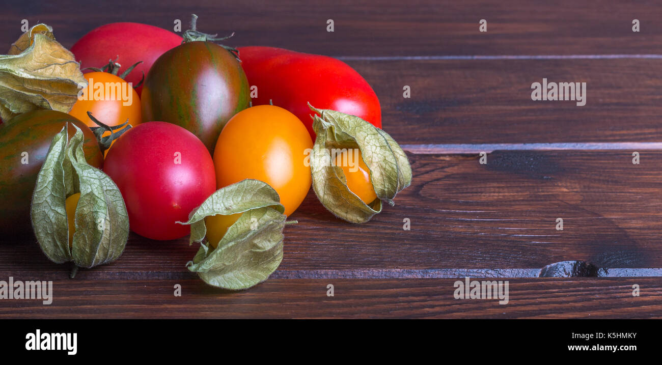 biological tomatoes and berry's Stock Photo - Alamy