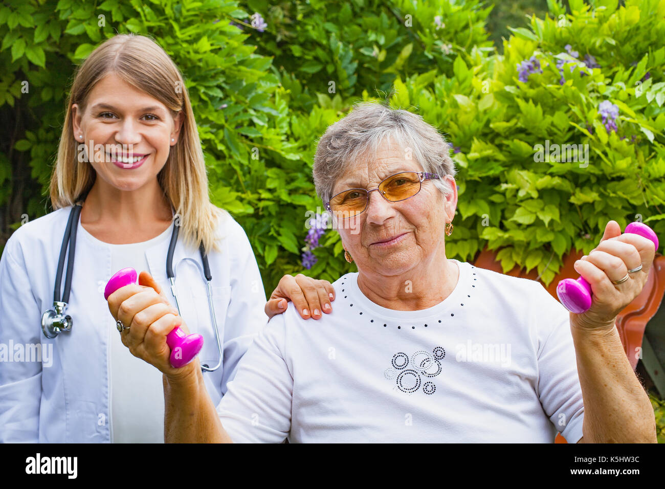 Doctor doing recovery exercises disabled hi-res stock photography and ...