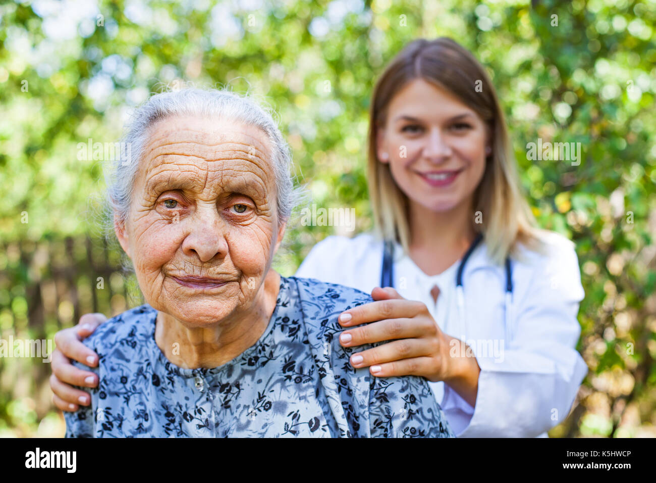 Senior lady with multiple medical conditions spending time with ...