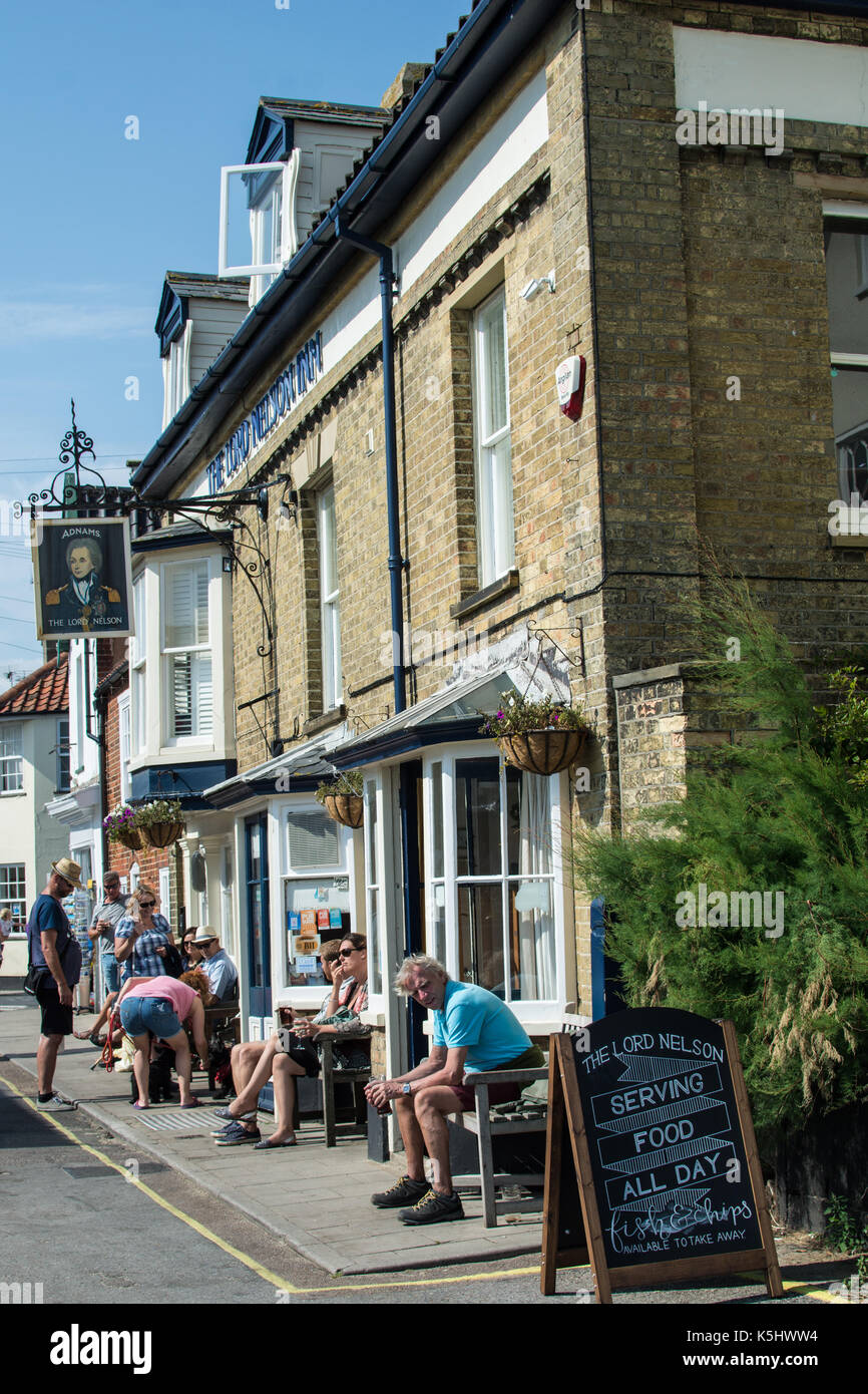 Southwold England Admiral Lord Nelson Pub bar tourists sign signs sit ...
