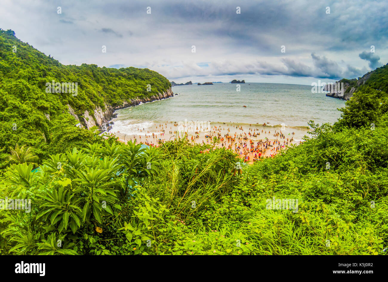 overcrowded beach in Cat Ba Island - it is a popular summer destination ...