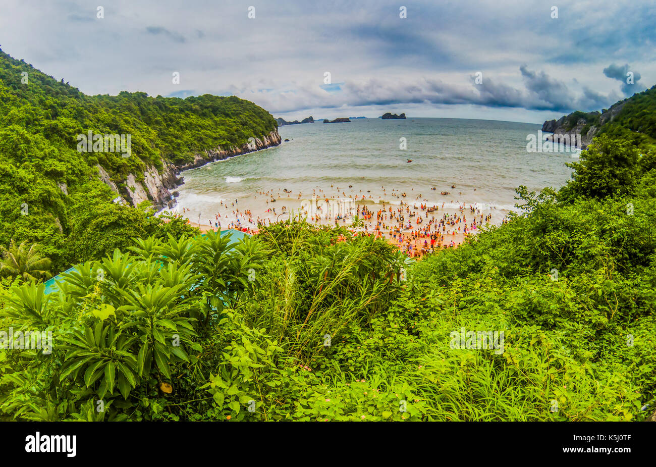 overcrowded beach in Cat Ba Island - it is a popular summer destination ...