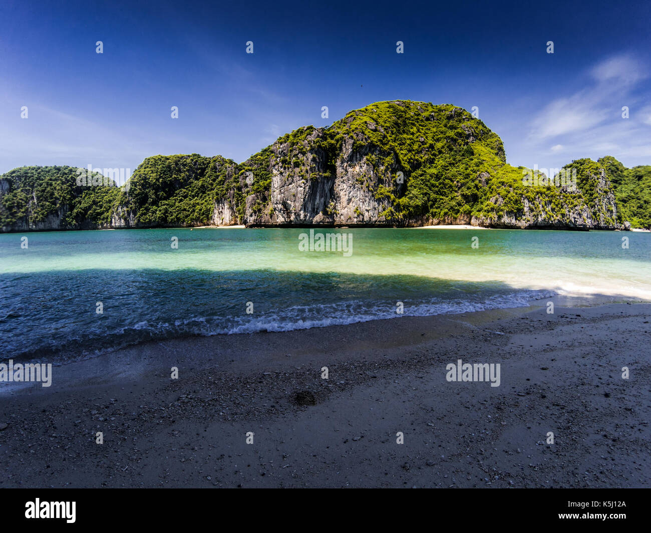 beautiful secluded beaches among limestone rocks on a sunny day in Lan ...