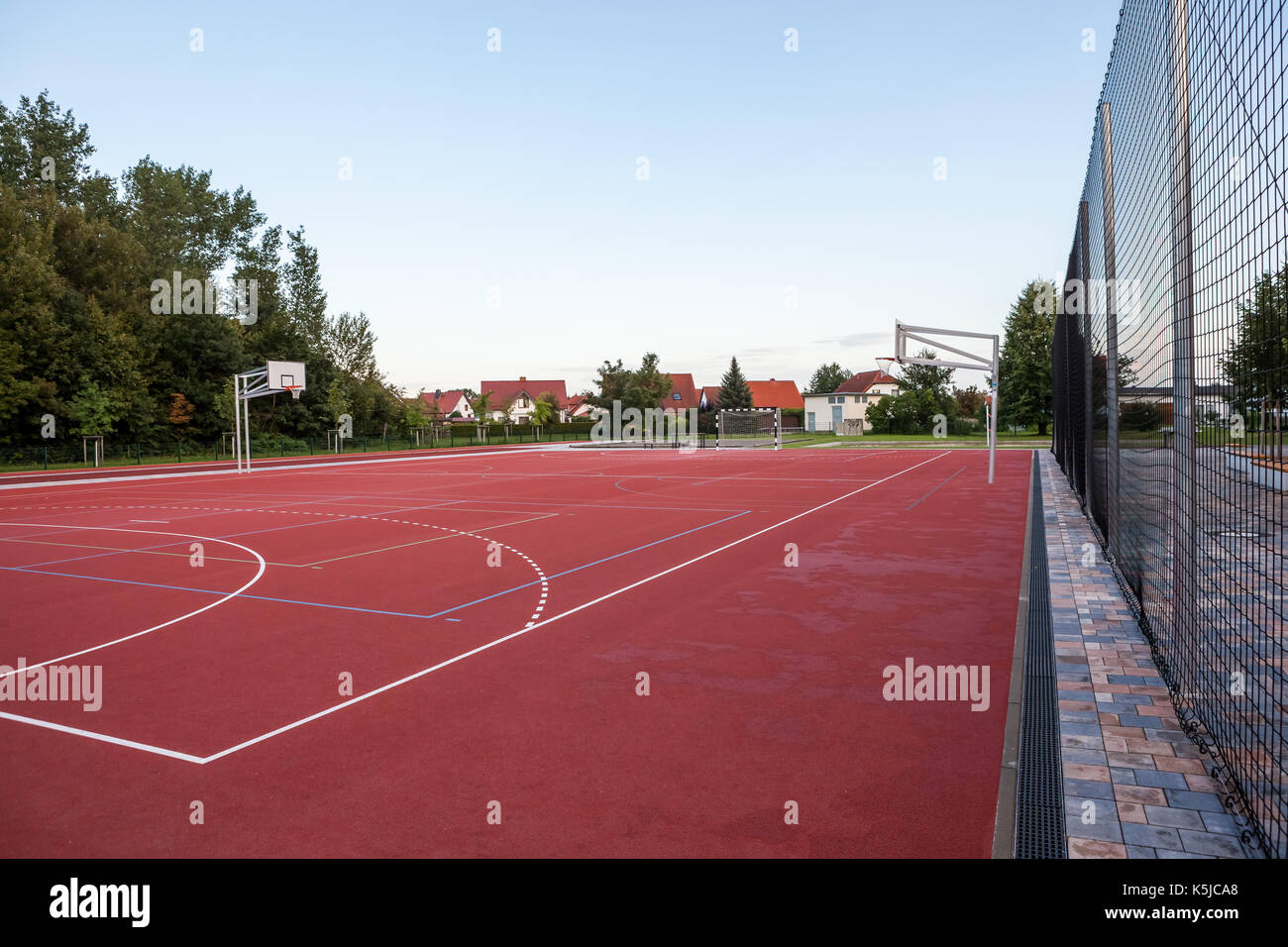 outdoors this beautiful mini soccer field is in red Stock Photo - Alamy