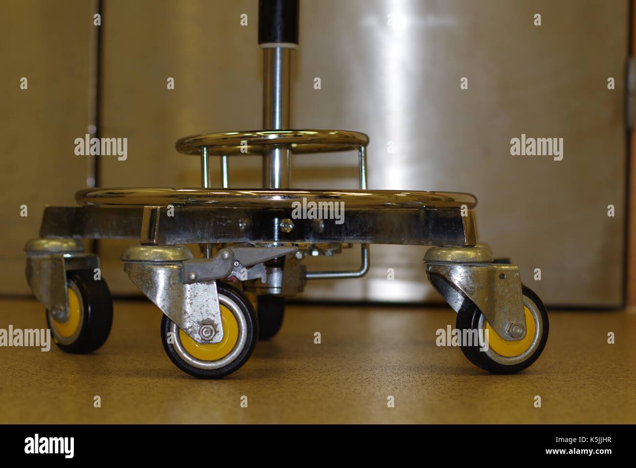 The Base of a Wheely Chair, Surgeon's Medical Stool, in a Modern ...