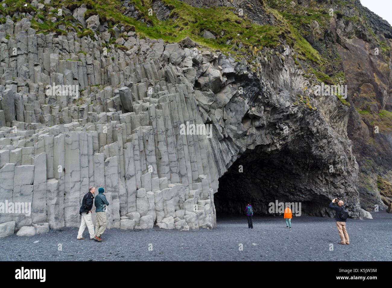 Basalt columns and cave at Reynisfjara black sand beach in Iceland Stock Photo - Alamy