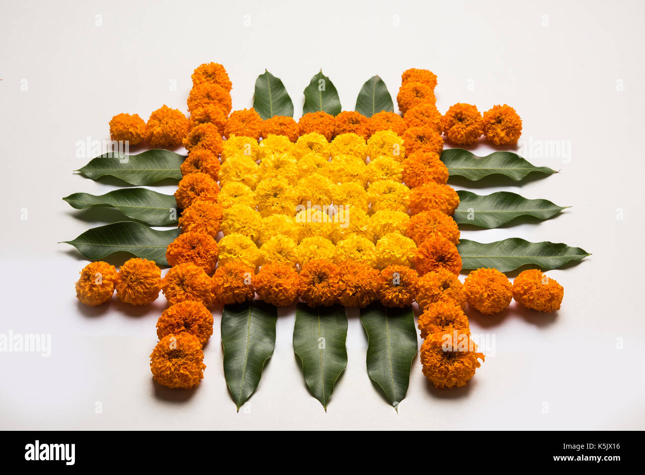 flower rangoli for Diwali or pongal or onam made using marigold or ...