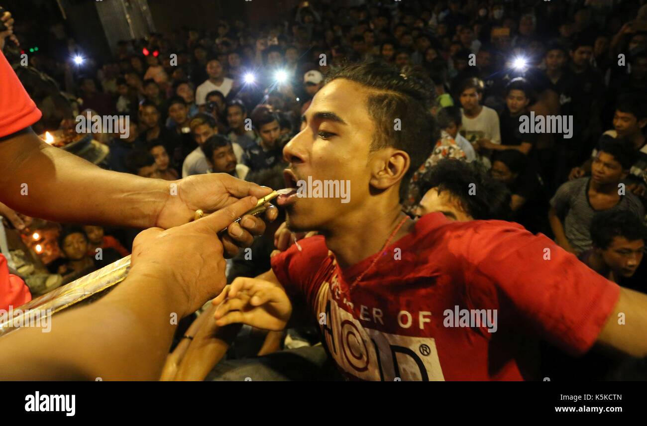 Kathmandu, Nepal. 09th Sep, 2017. Nepalese youth struggle to drink ...