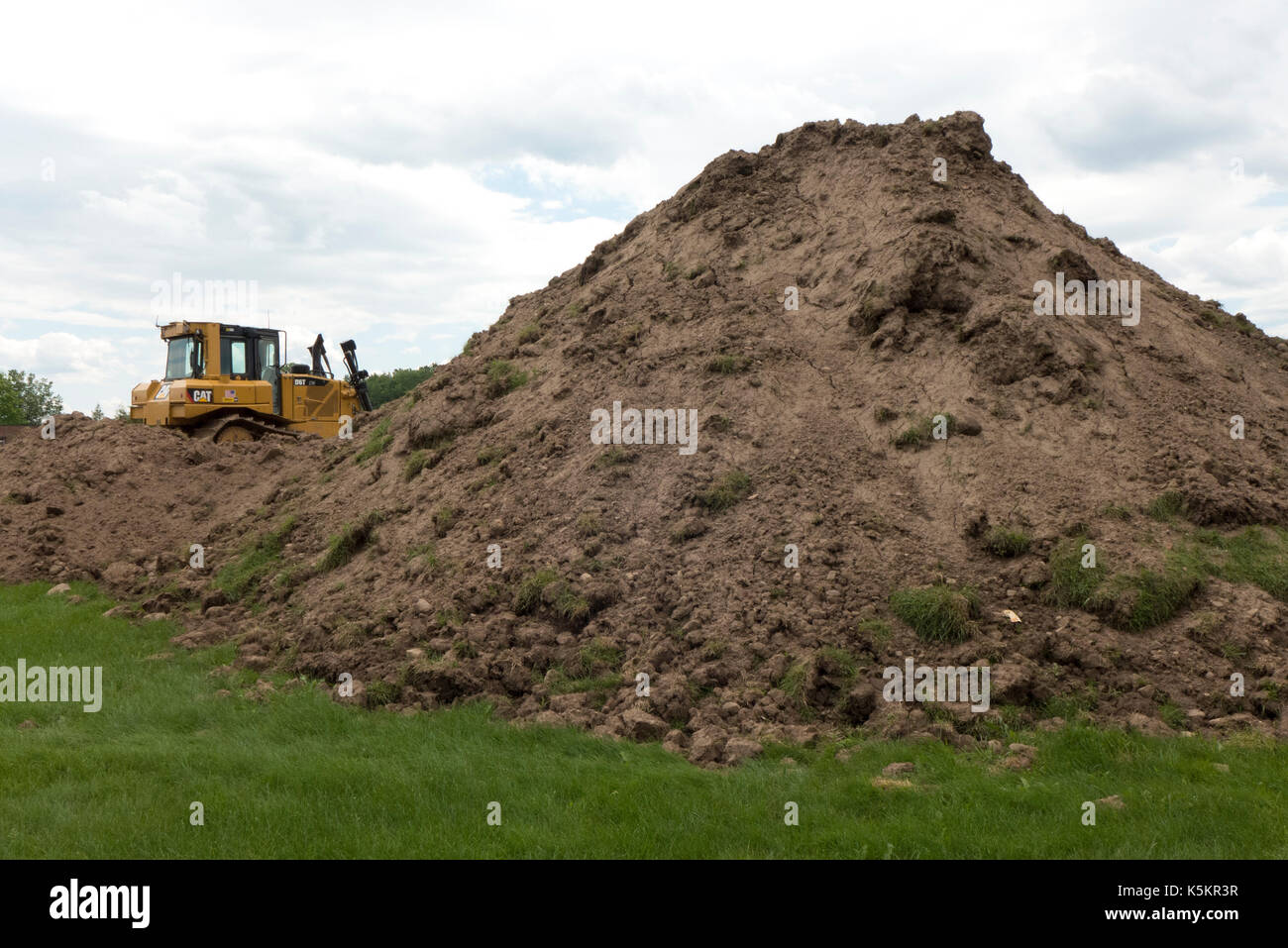 Earth moving with heavy equipment Stock Photo - Alamy