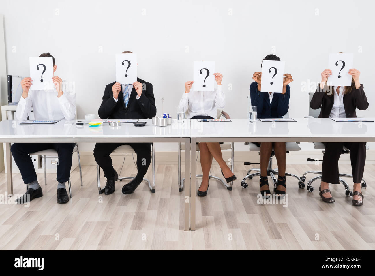 Business team face question mark hi-res stock photography and images ...