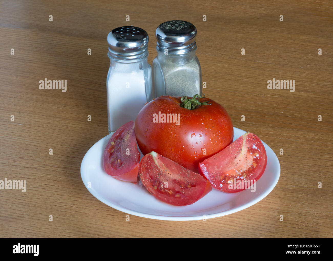 Tomato wedges hi-res stock photography and images - Alamy