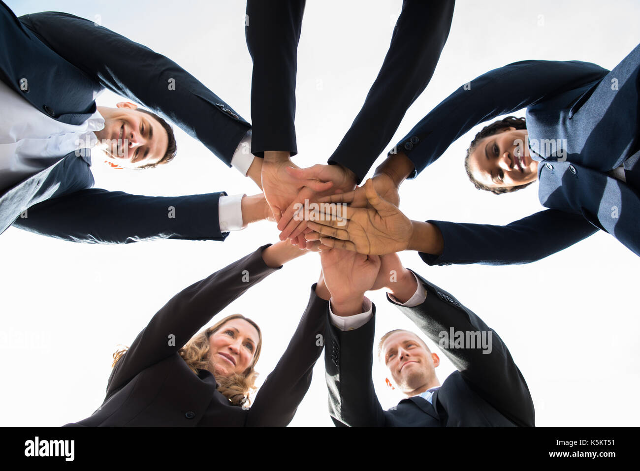 Multicultural hands pile hi-res stock photography and images - Alamy
