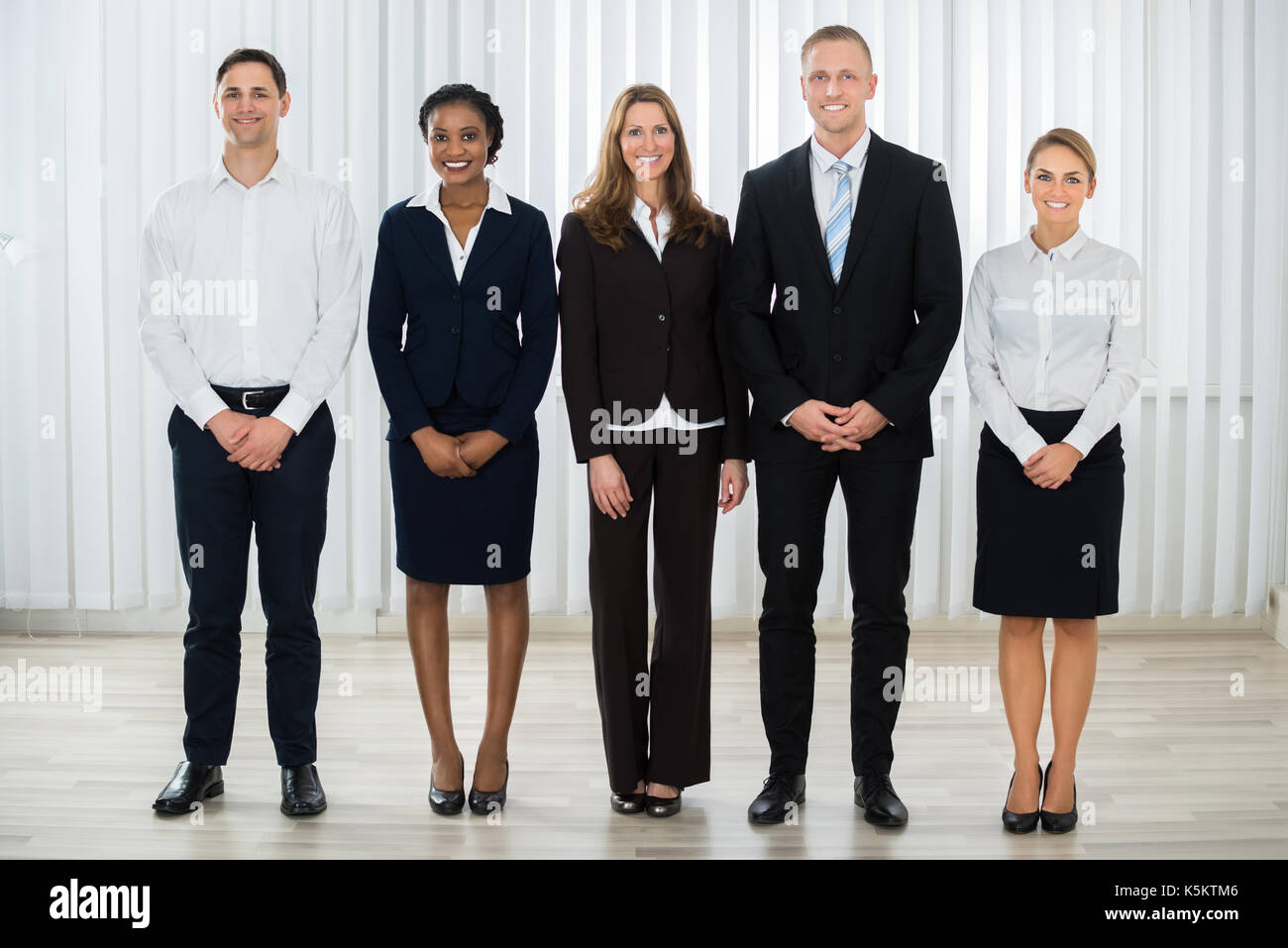 Happy workplace group hi-res stock photography and images - Alamy