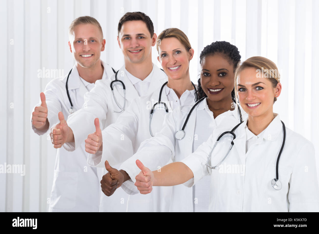 Diverse medical group standing in hi-res stock photography and images ...
