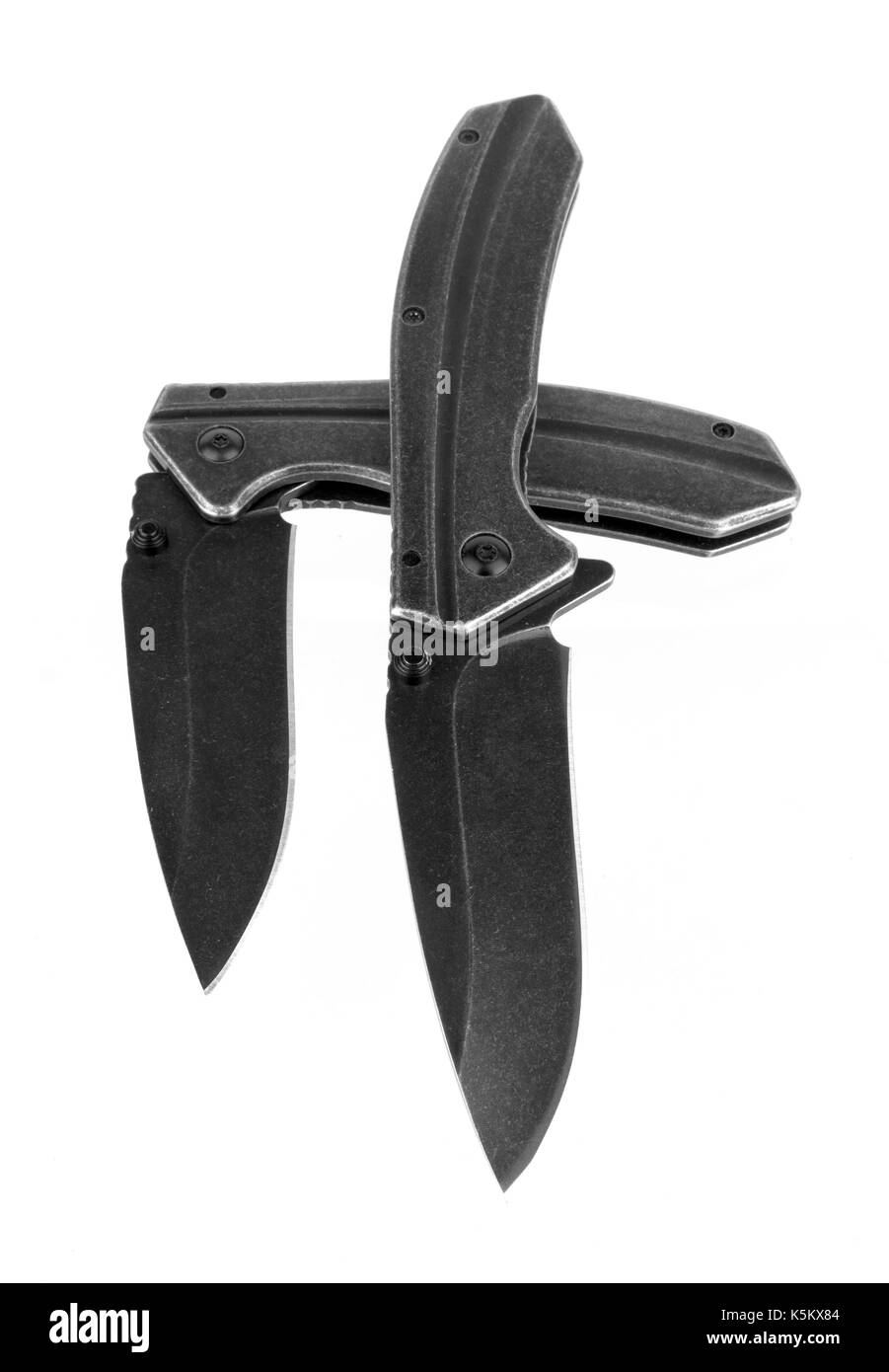 Sharp folding knifes with stainless steel handle. EDC knife close-up on ...