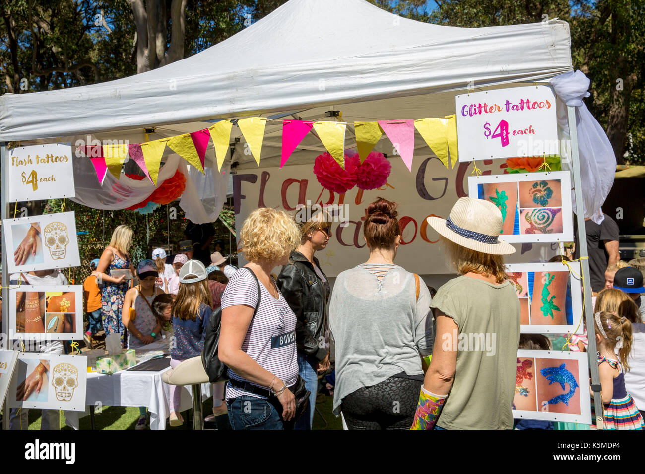 Australian primary school summer fete with stall selling glitter ...
