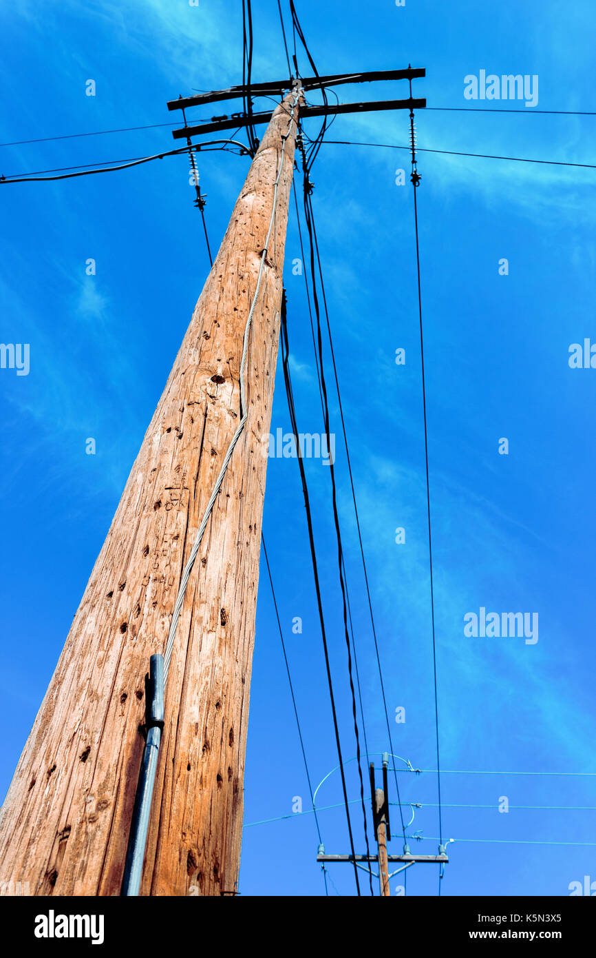 Wooden wood poles power lines hi-res stock photography and images - Alamy