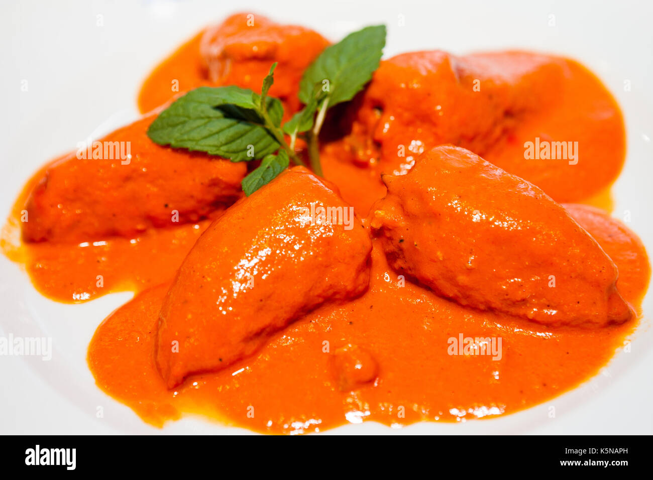 Red peppers with meat Stock Photo - Alamy