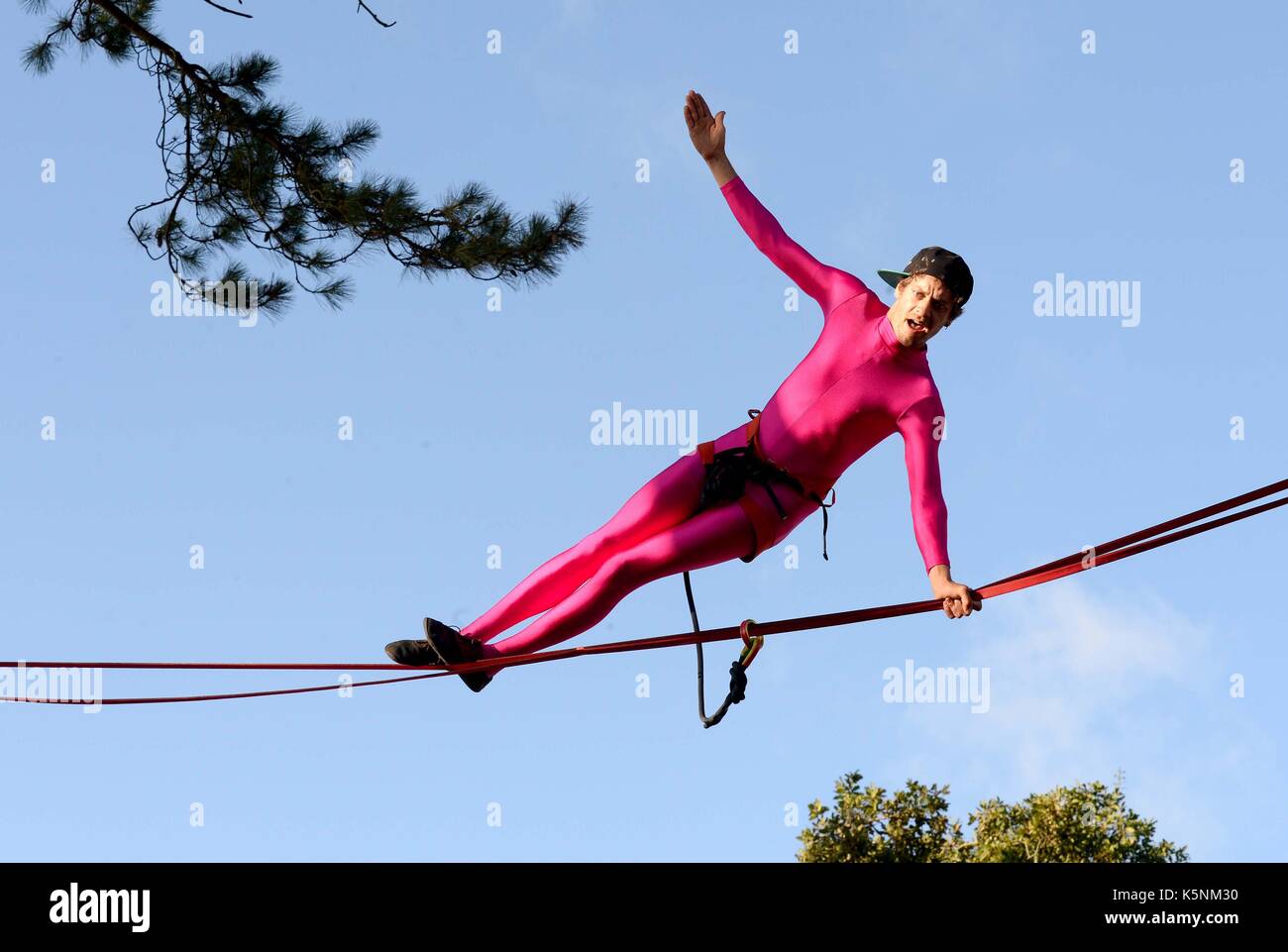 High wire act at Bestival Music Festival. Tightrope performer Credit ...