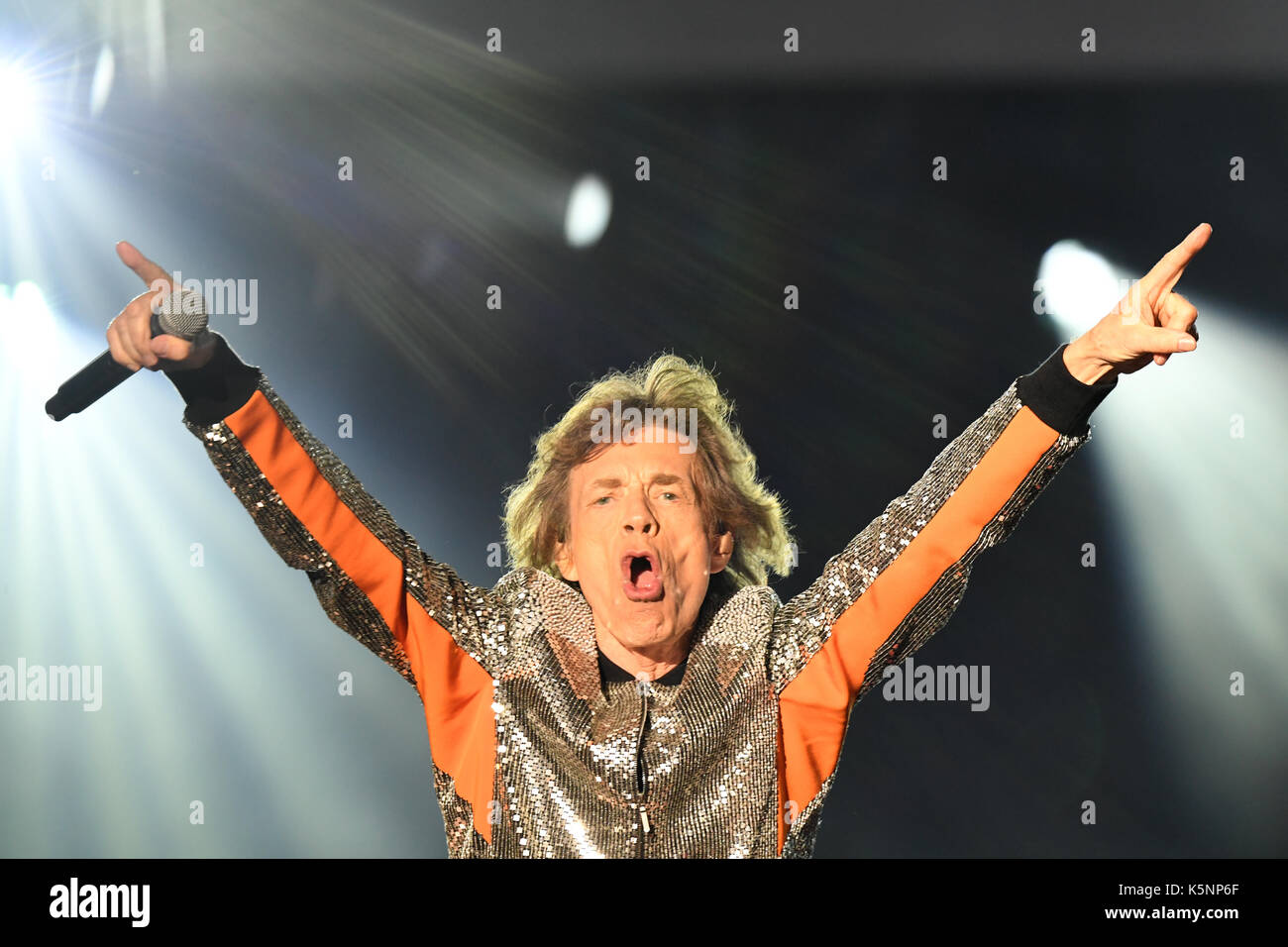 Mick Jagger performs on stage during the start of the Rolling Stones ...